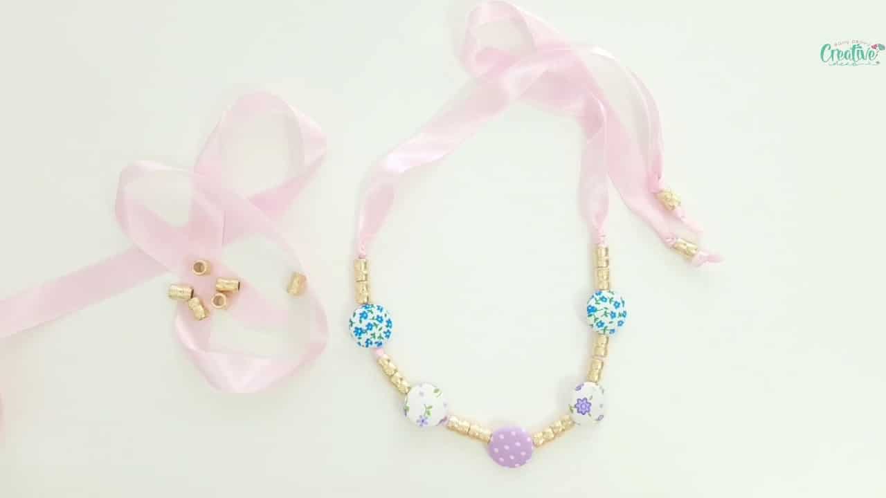 DIY Button Necklace With Fabric Buttons, Ribbon & Gold Cord Ends