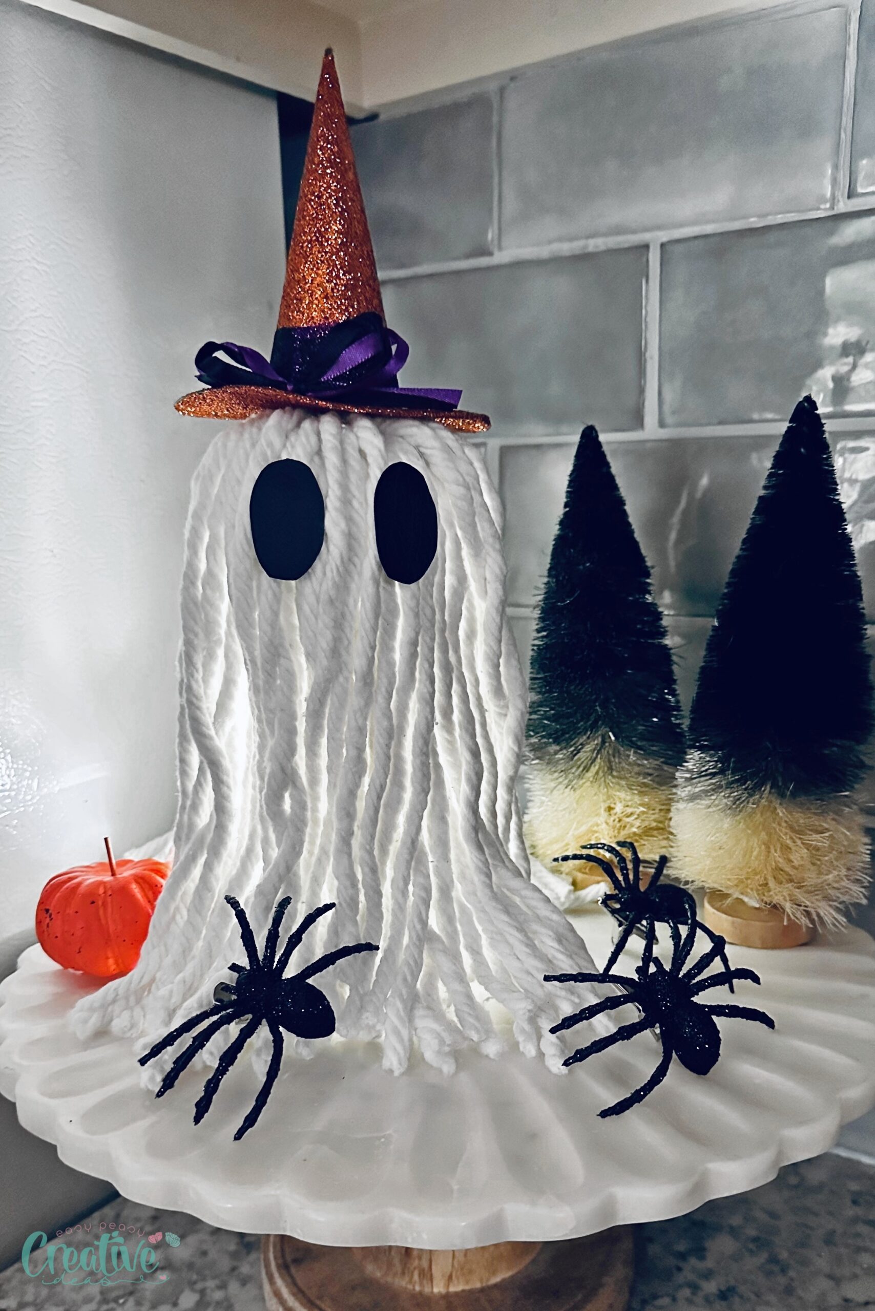 Spooky cute mop ghost craft - Easy Peasy Creative Ideas