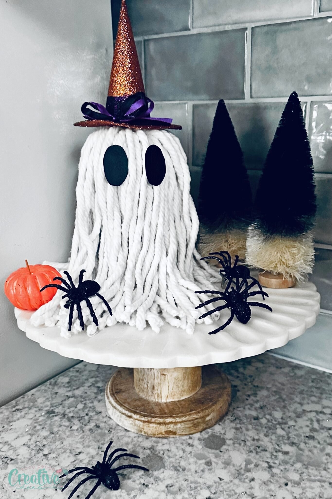 Spooky cute mop ghost craft - Easy Peasy Creative Ideas